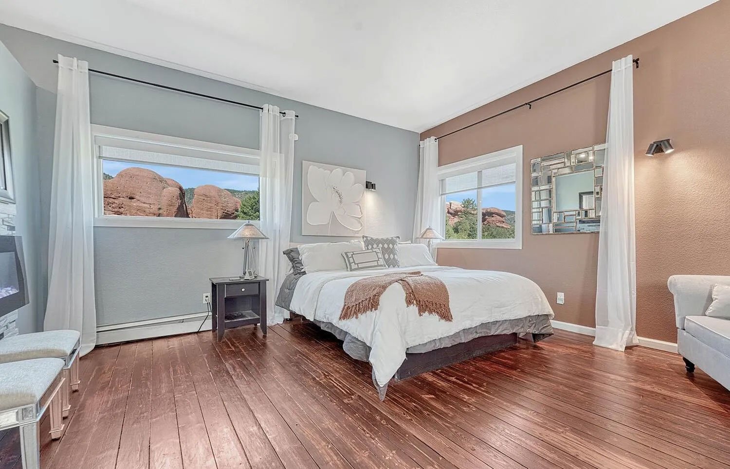 Home built into 200-million-year-old rock face on market for $1m ...