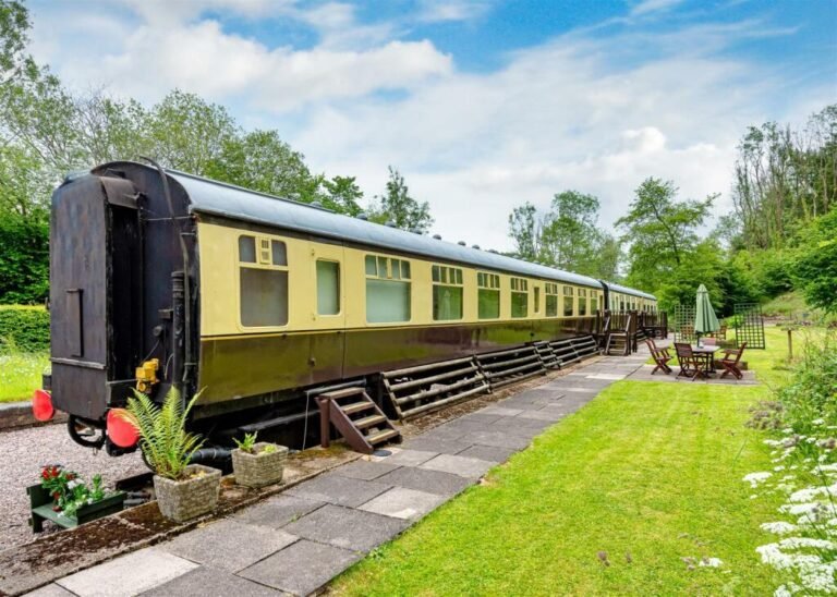 Converted Victorian railway station that comes with its own train ...